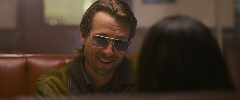 Glen Powell Takes Center Stage in New Photos from Netflix’s ‘Hit Man ...